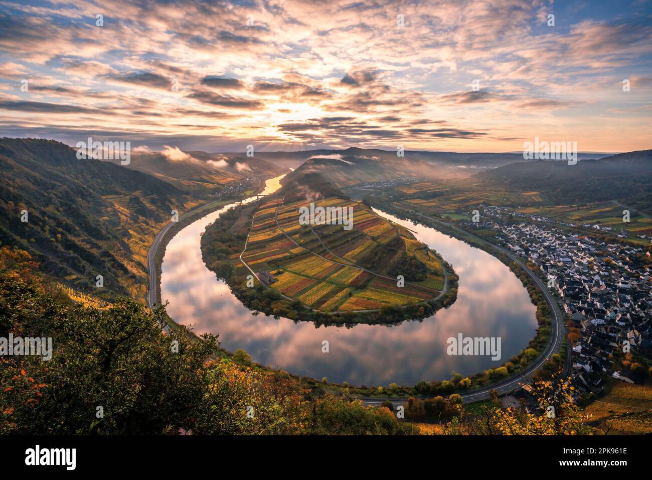 Beautiful sunrise in autumn over the river Mosel at the Mosel loop and ...