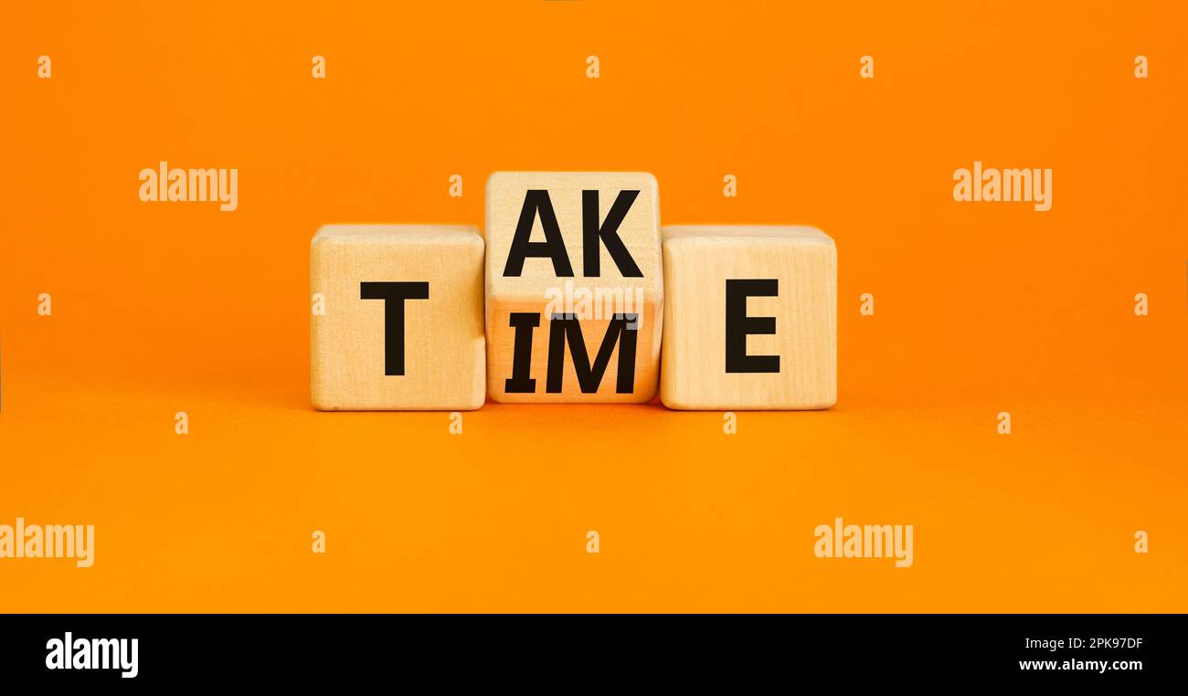 Take your time symbol. Concept word Take Time on wooden cubes ...