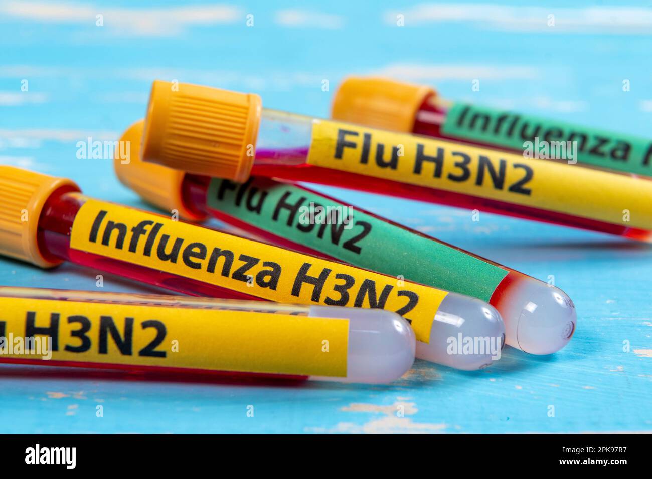 vacuum vials for blood collection written FLU H3N2 in reference to the ...