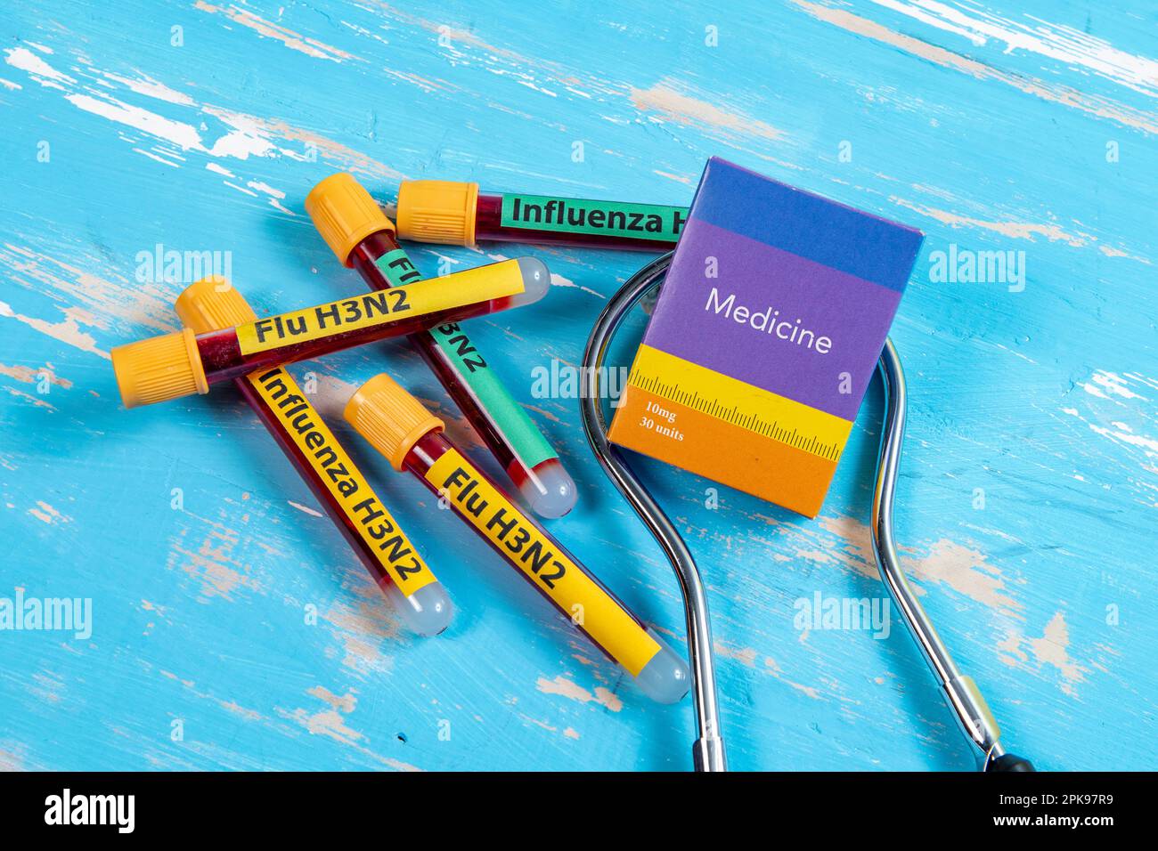 vacuum vials for blood collection written FLU H3N2 in reference to the ...