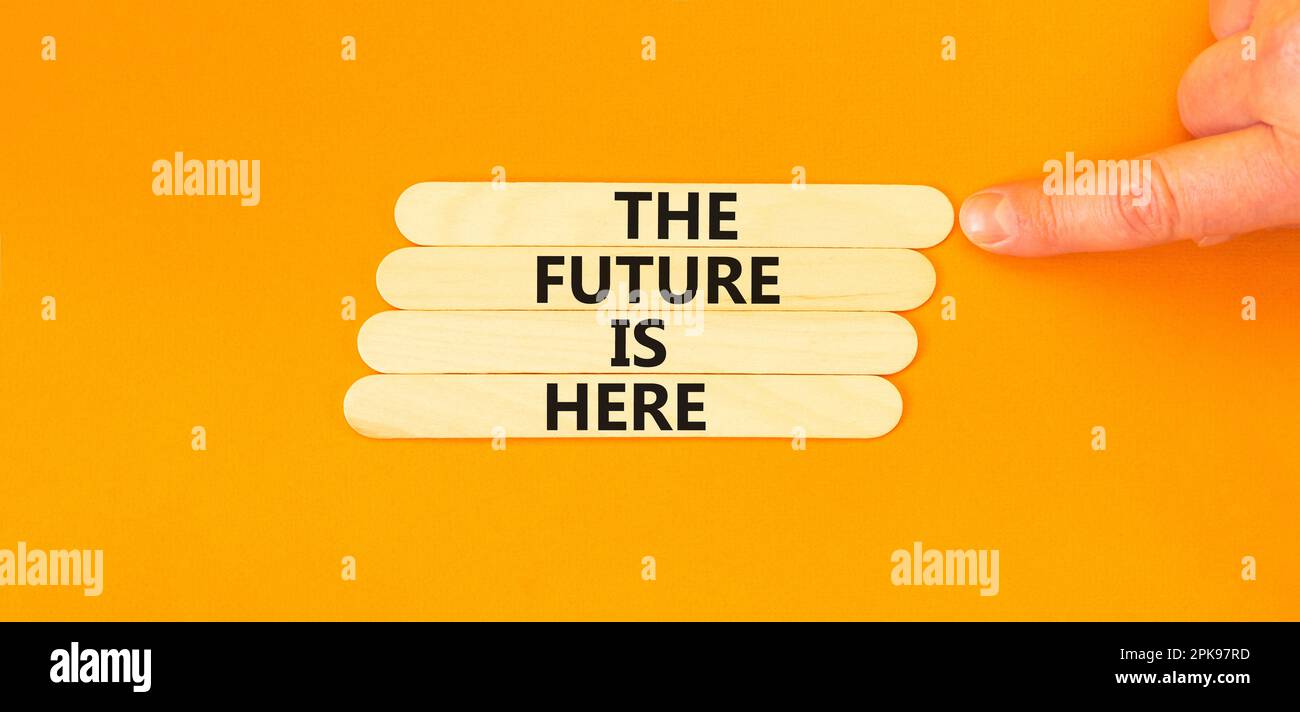 The future is here symbol. Concept words The future is here on wooden ...