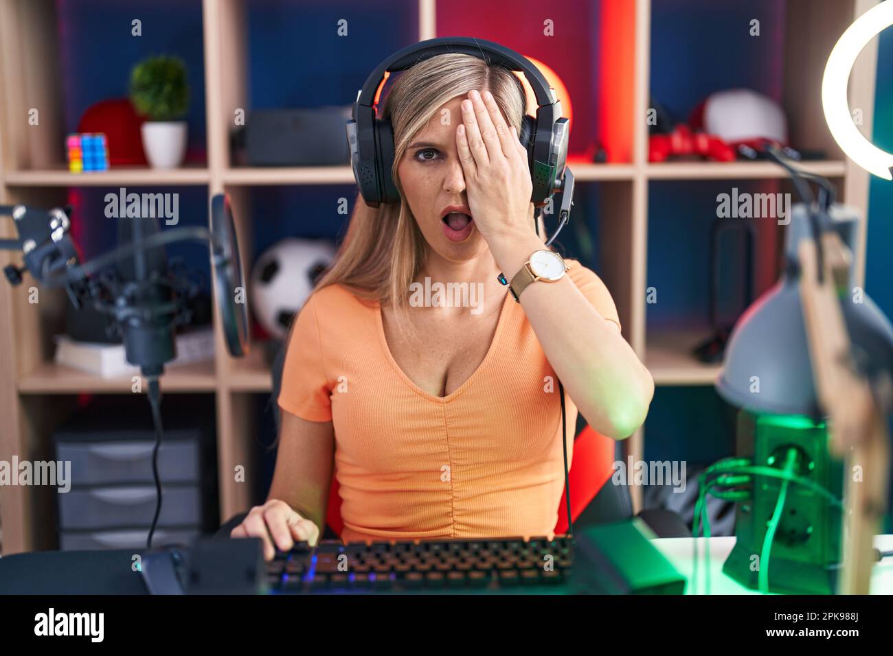 Tired female gamer playing video games hi-res stock photography and ...