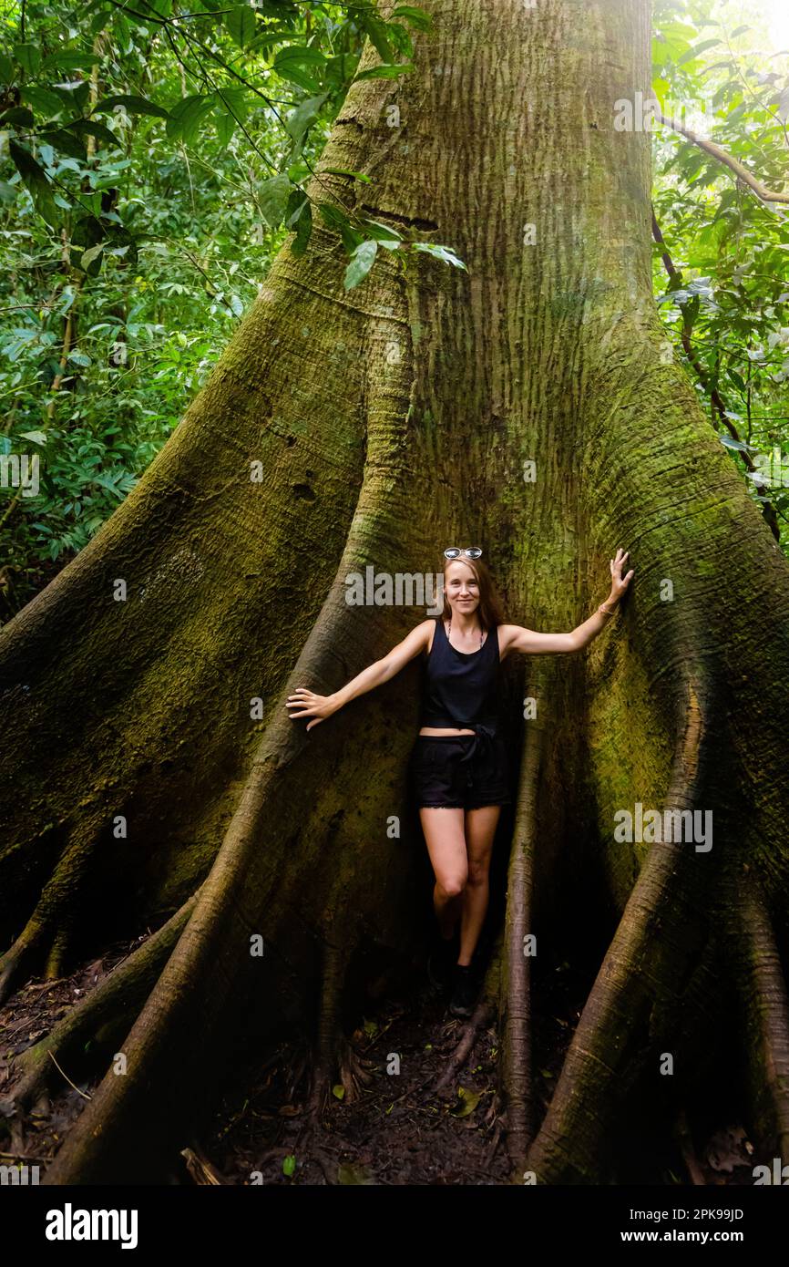 Beautiful young woman wearing black clothes in jungle of Palenque ...