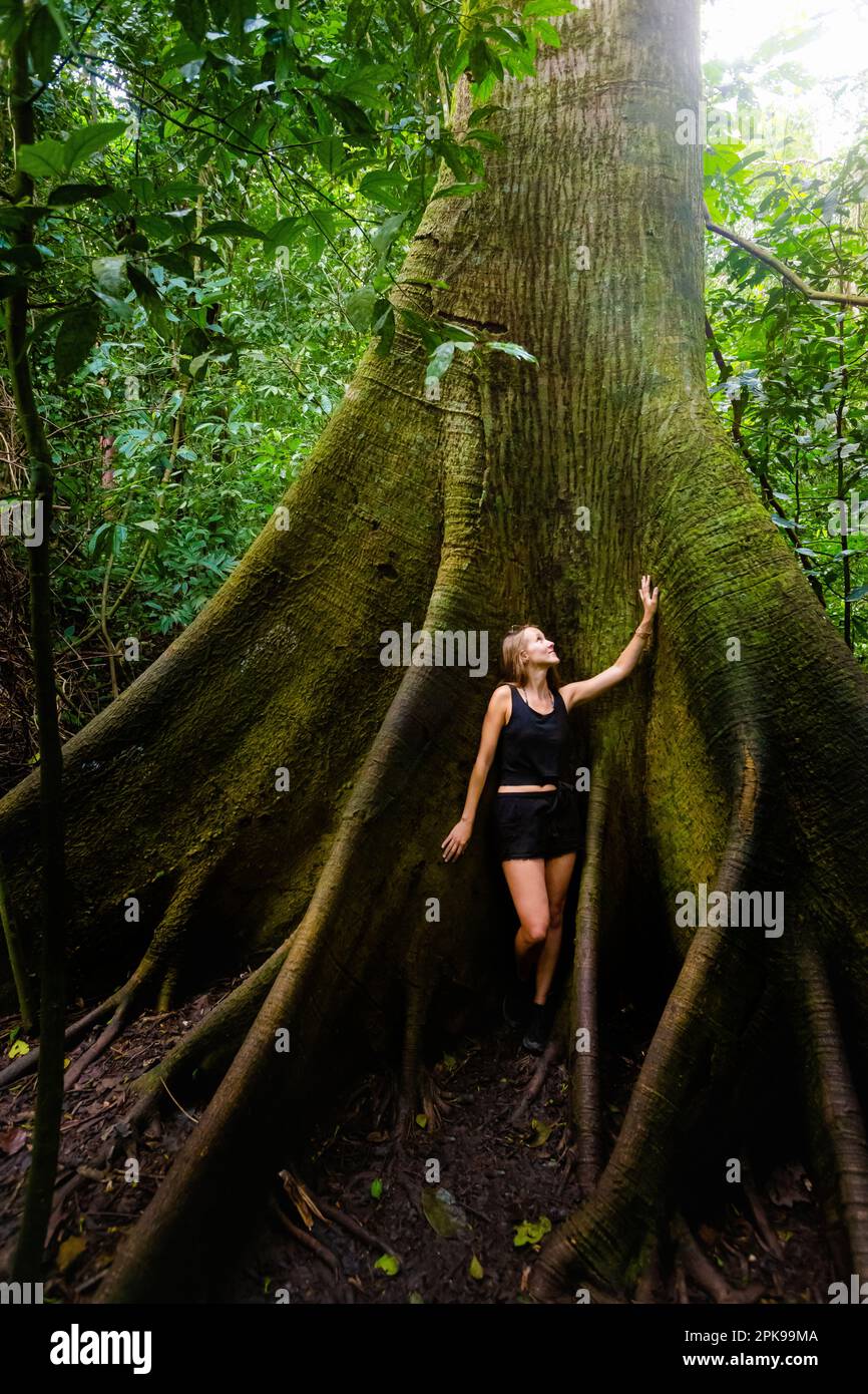 Beautiful young woman wearing black clothes in jungle of Palenque ...