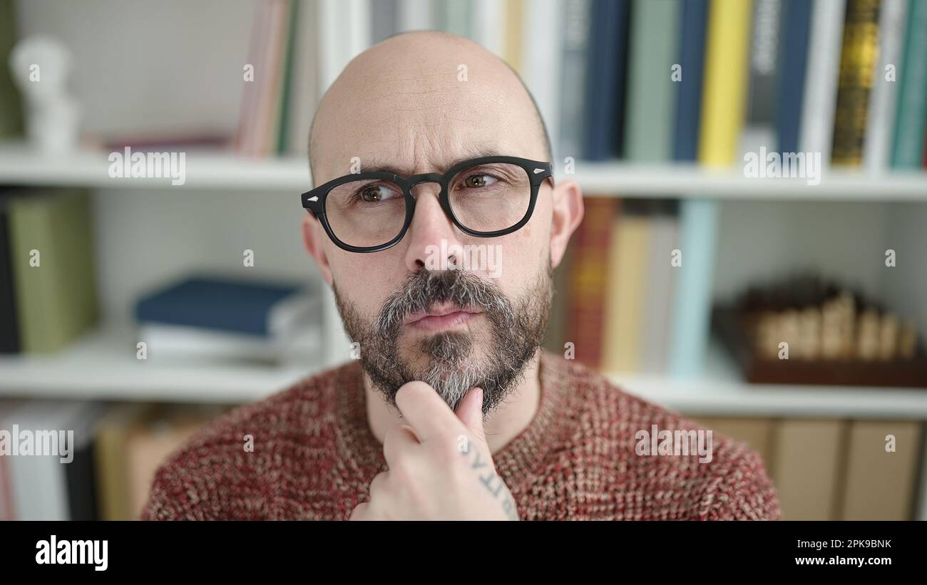 Young bald man teacher teaching hi-res stock photography and images - Alamy