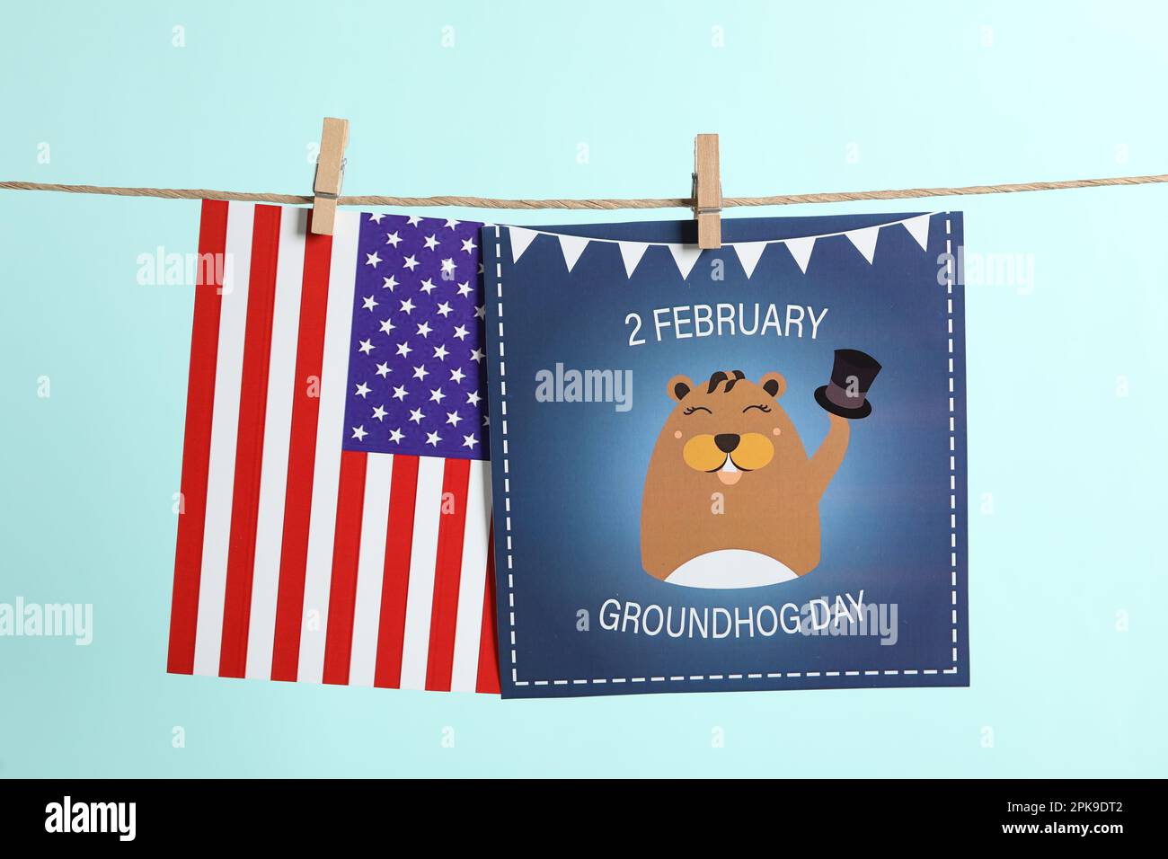 Happy Groundhog Day greeting card and American flag hanging on ...
