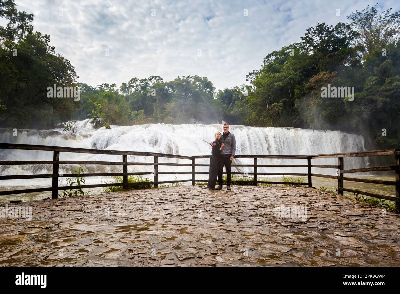 Beautiful young tourists couple in Agua Azul cascades park in Palenque ...
