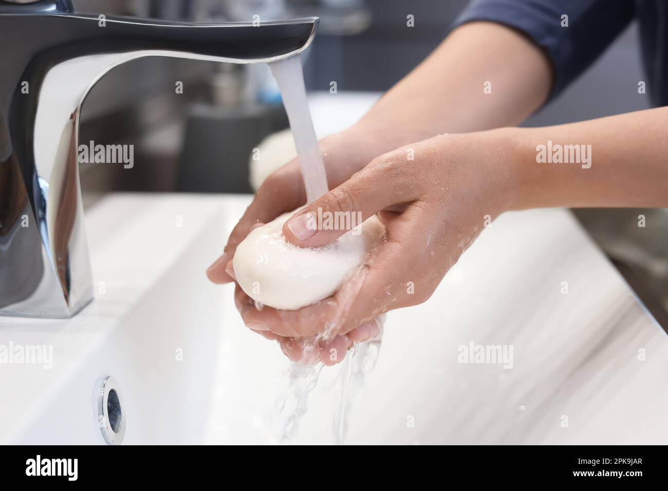 Woman washing hands bar soap hi-res stock photography and images - Alamy