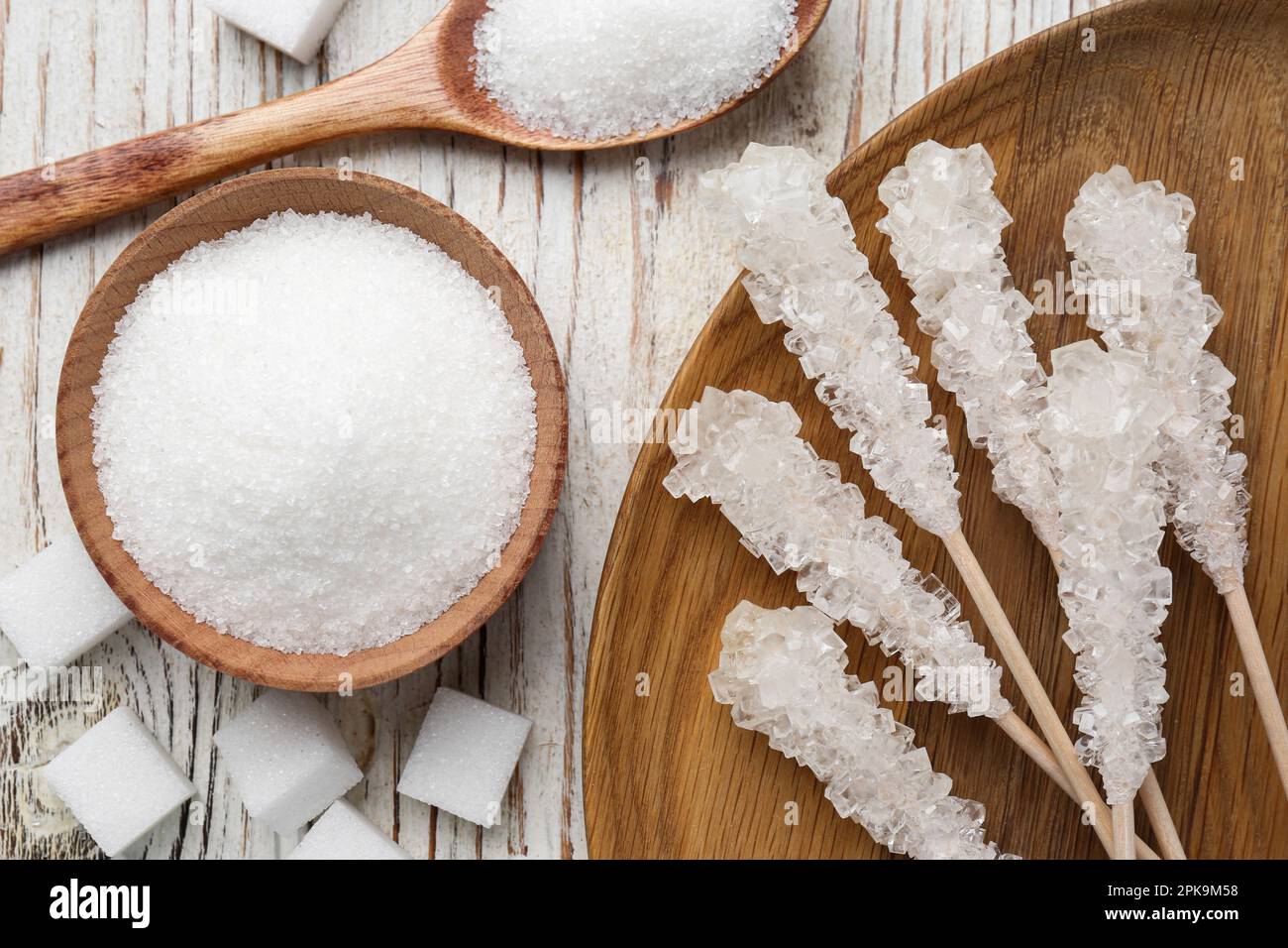 Different types of sugar on white wooden table, flat lay Stock Photo ...