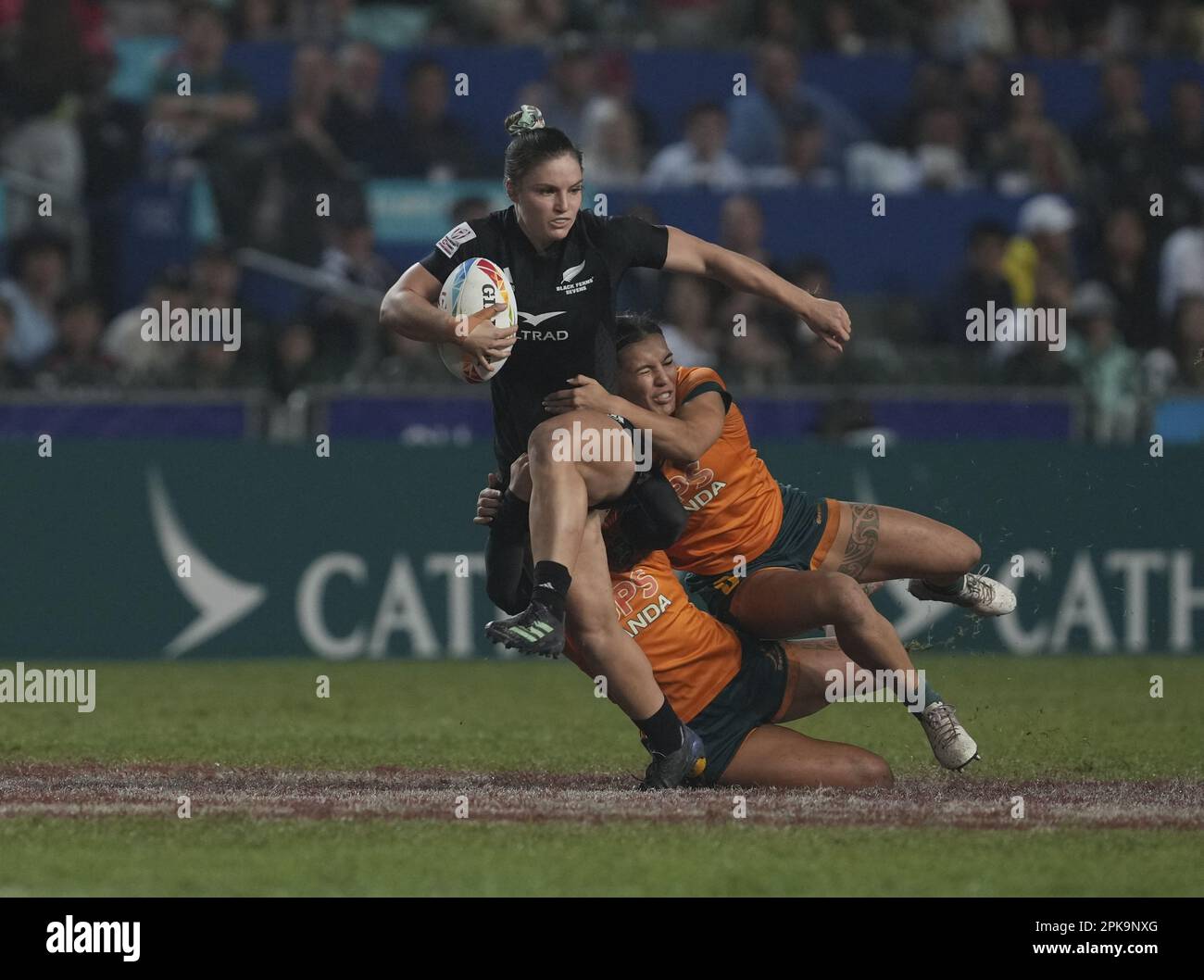 New ZealandHH Michaela Blyde runs with the ball, tackled by Australian ...