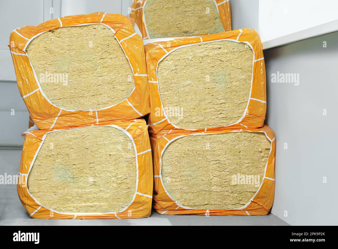 Packages of thermal insulation material in room Stock Photo - Alamy