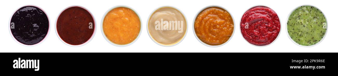 Set with different tasty fruit puree on white background, top view ...