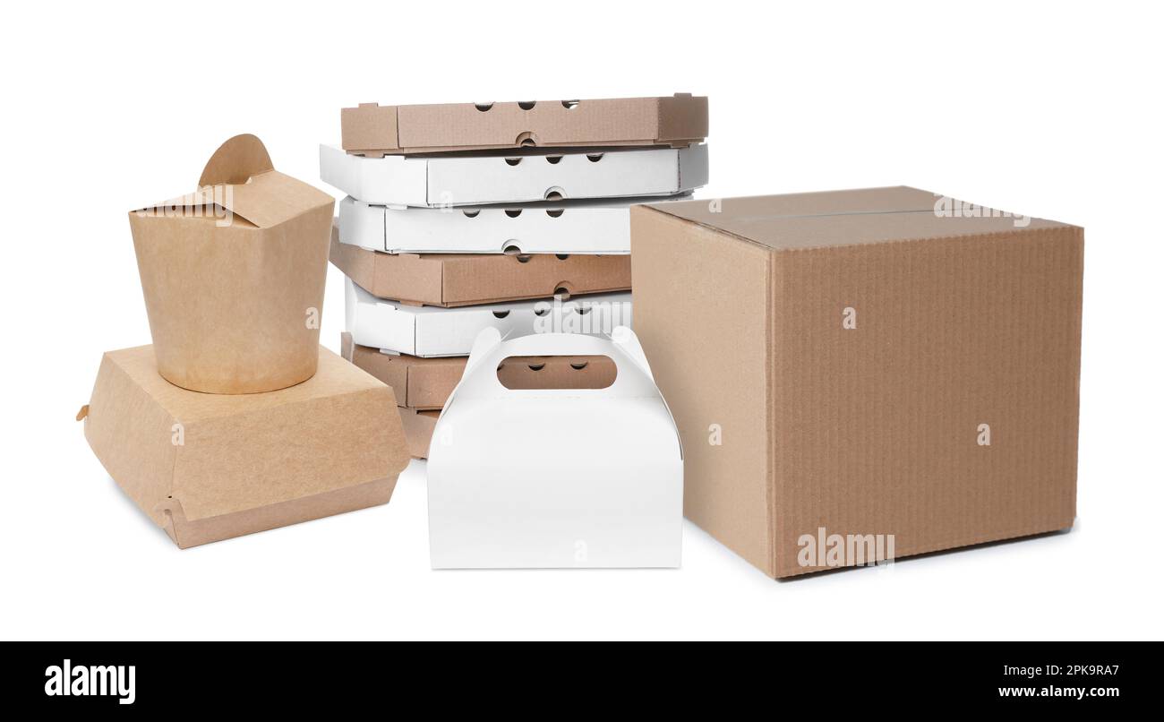 Set with different cardboard boxes on white background Stock Photo - Alamy