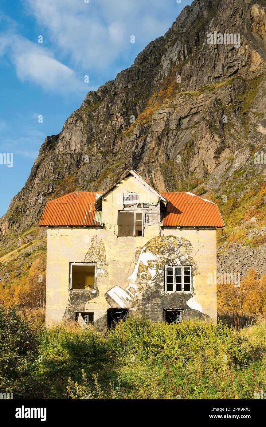 Norway, Lofoten, island Gimsoy, abandoned house in front of rock Hoven ...