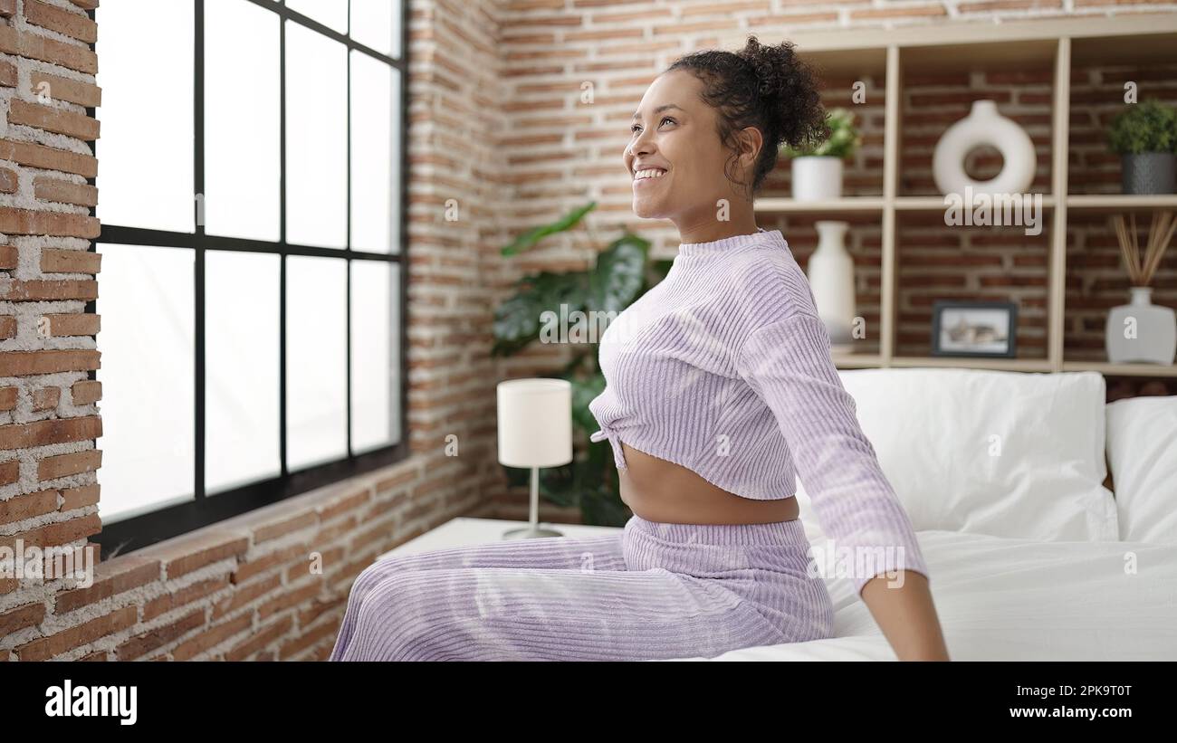 African american woman waking up stretching arms hi-res stock ...