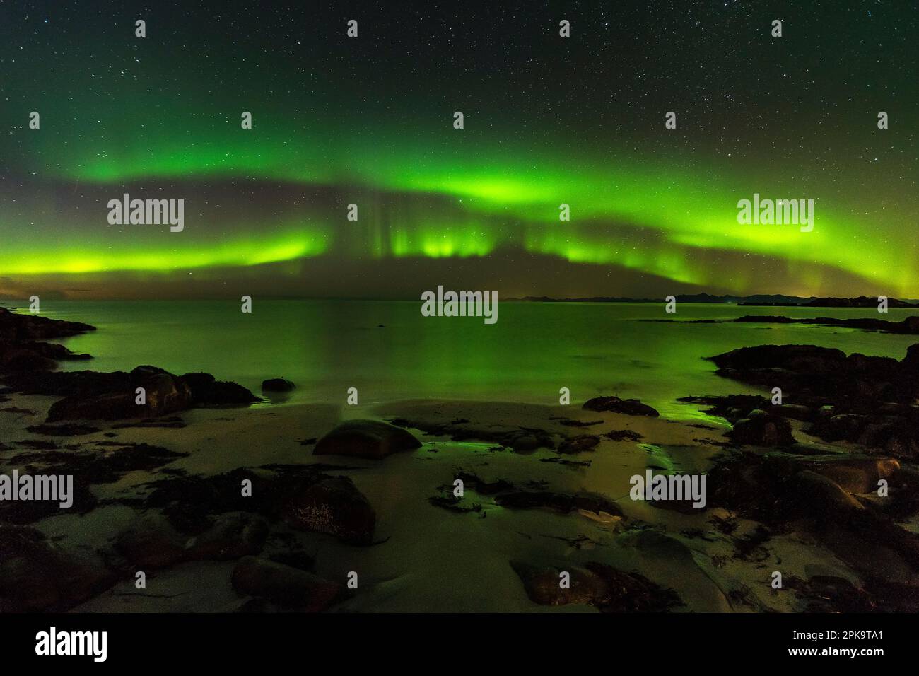 Norway, Lofoten, Gimsoy Island, Hov Gard, beach, aurora arch Stock ...