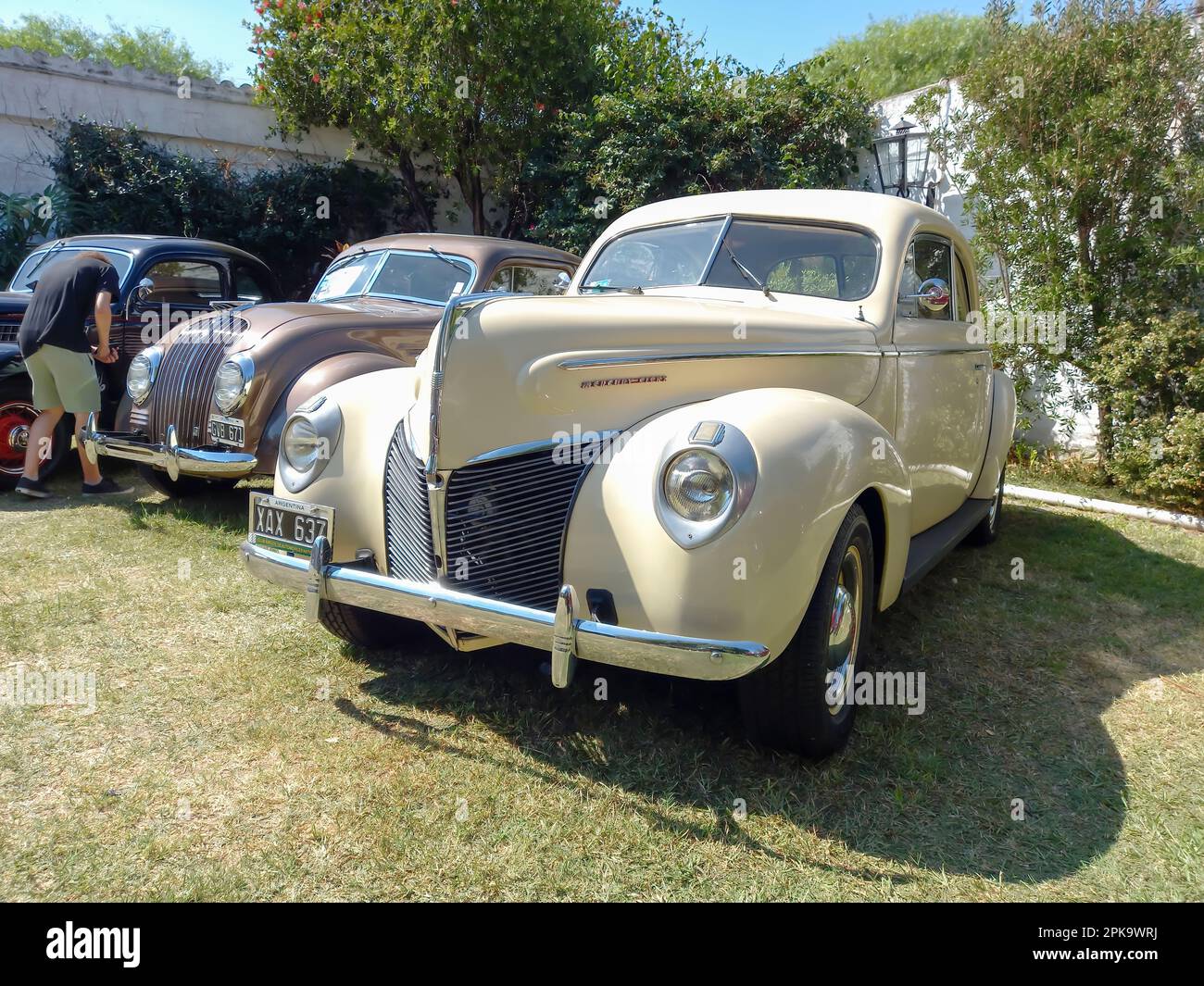 Old 1940 Ford Mercury Eight 8 two four door sedan in a garden. CADEAA ...