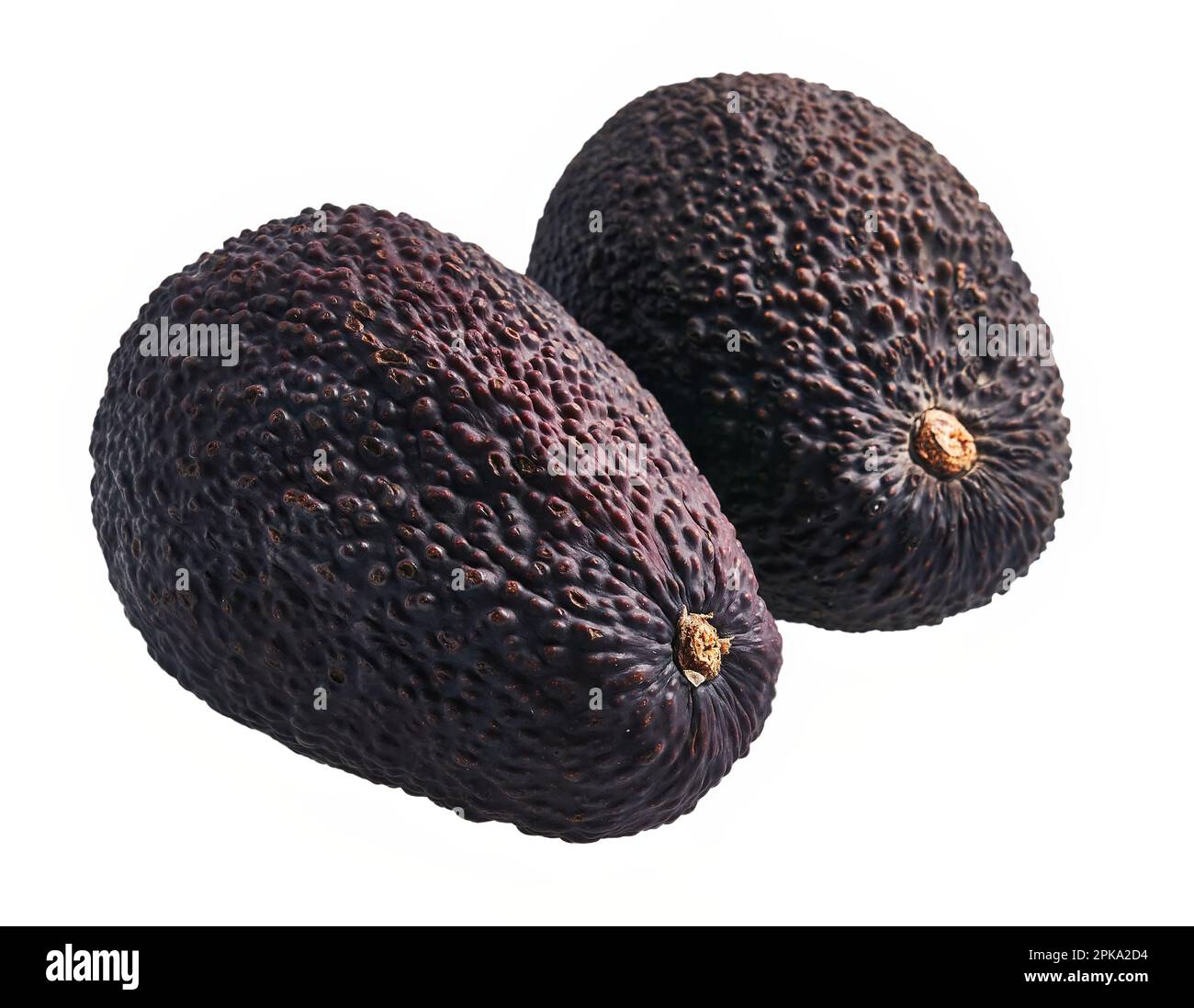 Delicious two avocados over isolated white background Stock Photo - Alamy