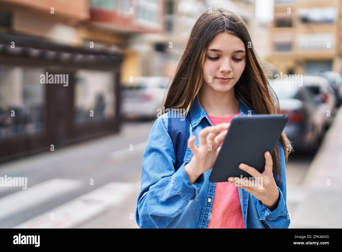 Adorable girl student using touchpad at street Stock Photo - Alamy Adorable girl student using touchpad at street Stock Photo - Alamy