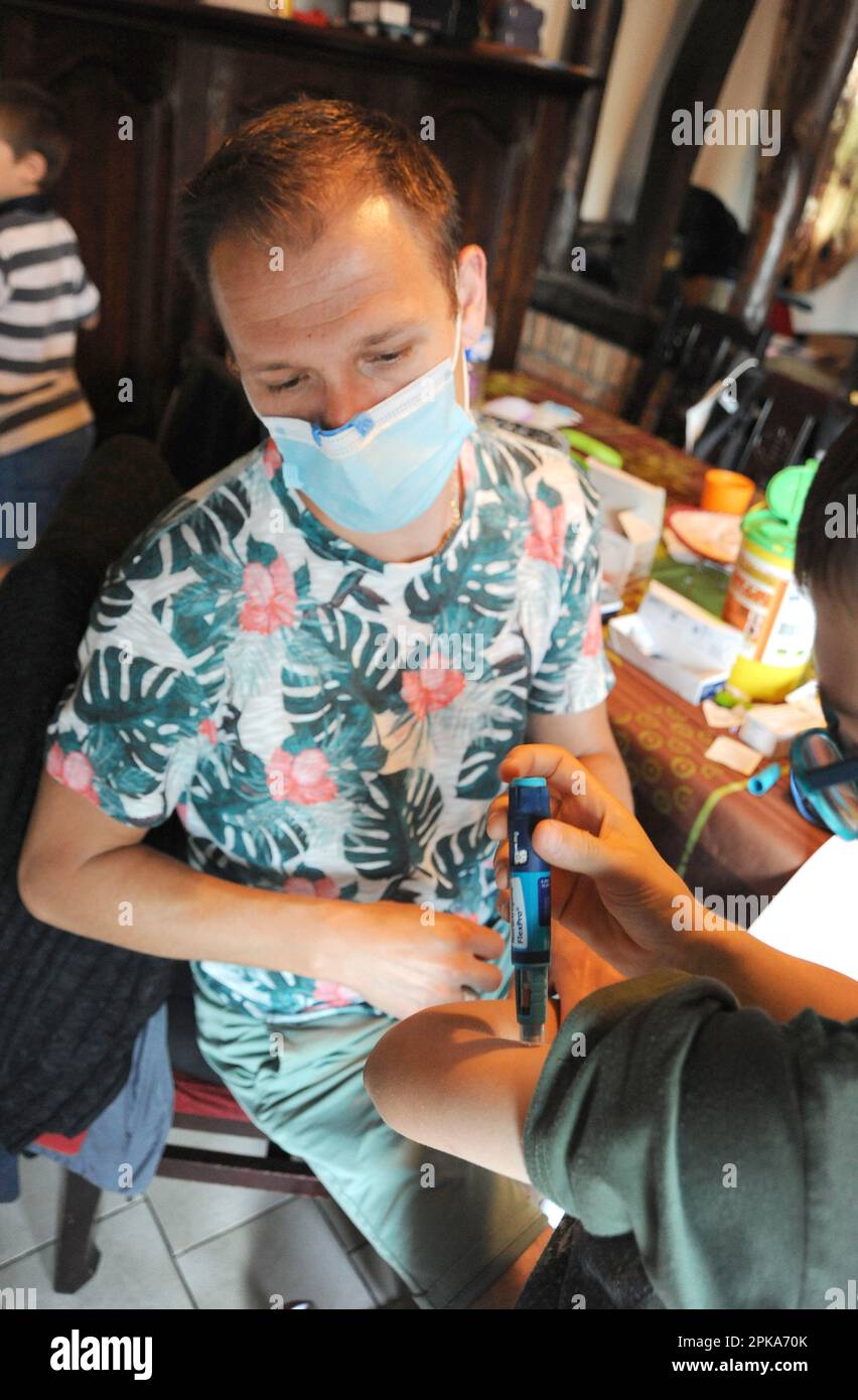 Liberal country nurse for subcutaneous injection of hormones in a ...