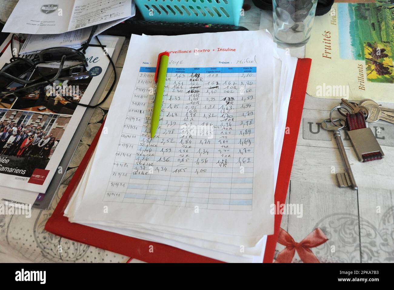 Self-employed country nurse at the home of a diabetic patient for blood ...