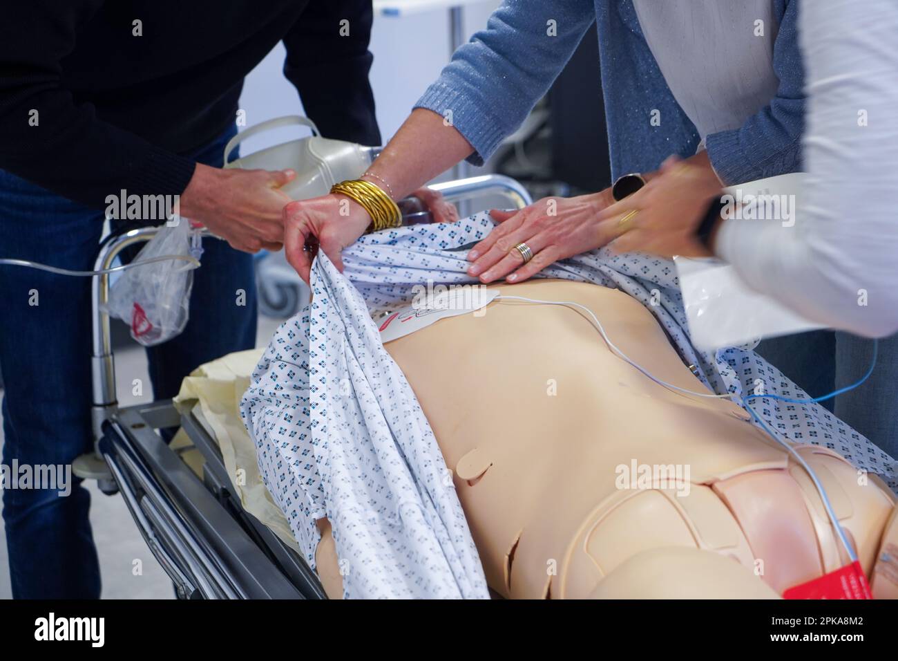 Resuscitation training on a dummy: defibrillator and respiratory aid Stock Photo - Alamy
