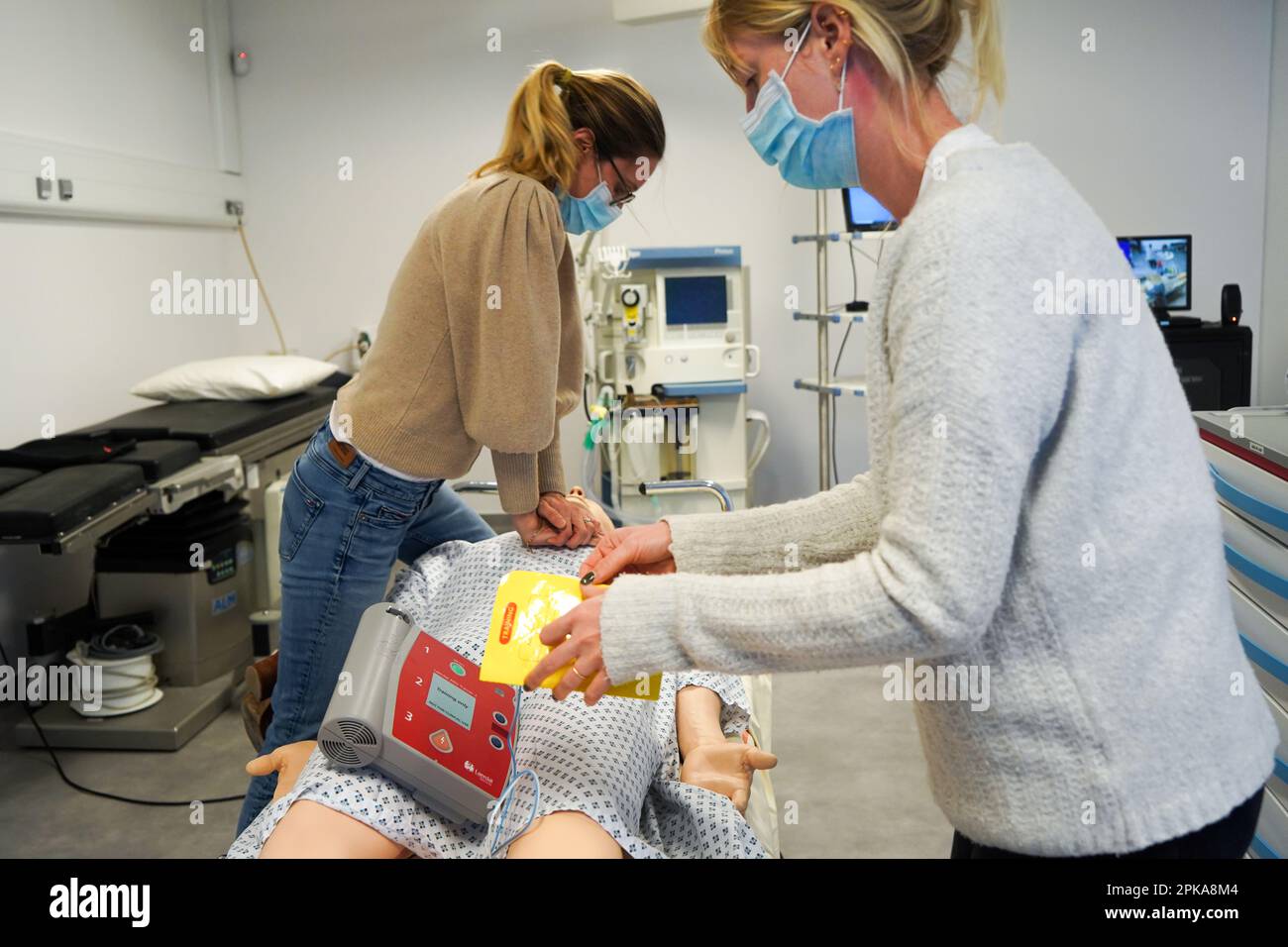 Resuscitation training on a dummy: cardiac massage and defibrillator ...