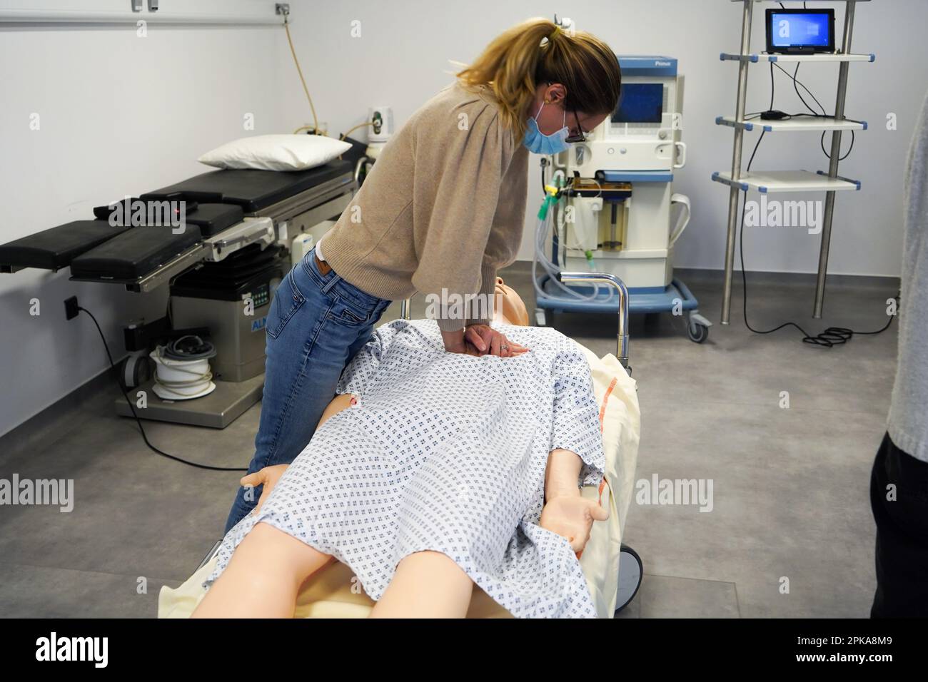 Resuscitation training on a dummy: cardiac massage Stock Photo - Alamy