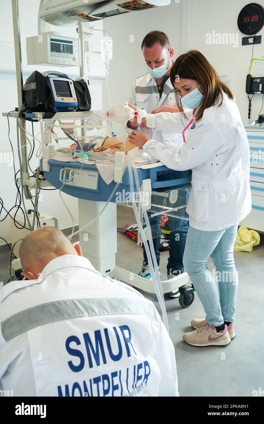 Newborn dummy emergency care training with breathing aid Stock Photo ...