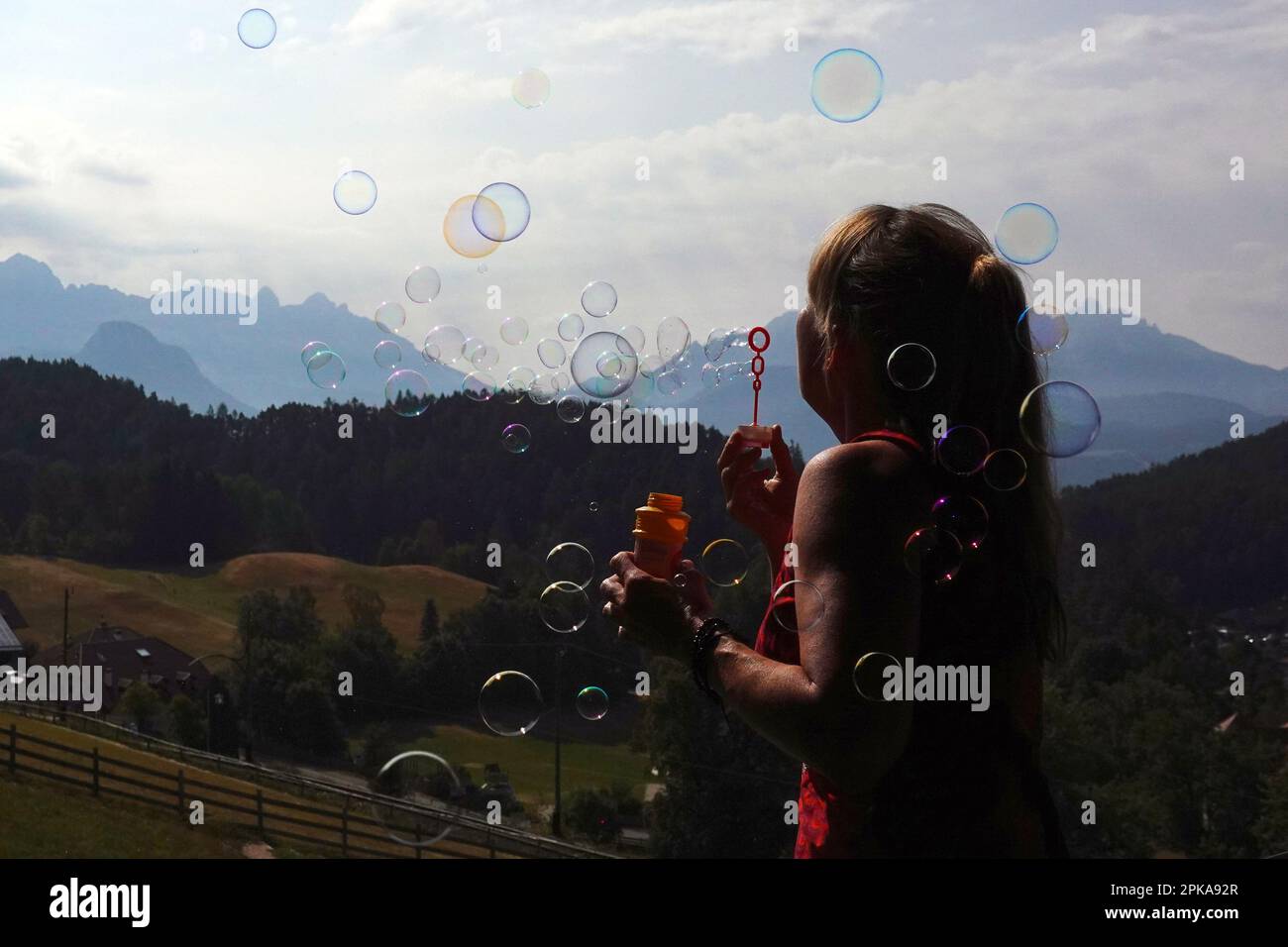 Blowing bubbles silhouette hi-res stock photography and images - Alamy
