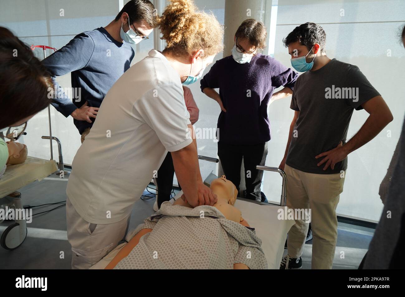 5th year medical students during a SimMan dummy cardiac massage ...