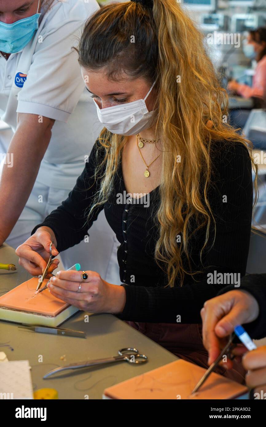 5th year students during a sewing workshop. The students learn the ...