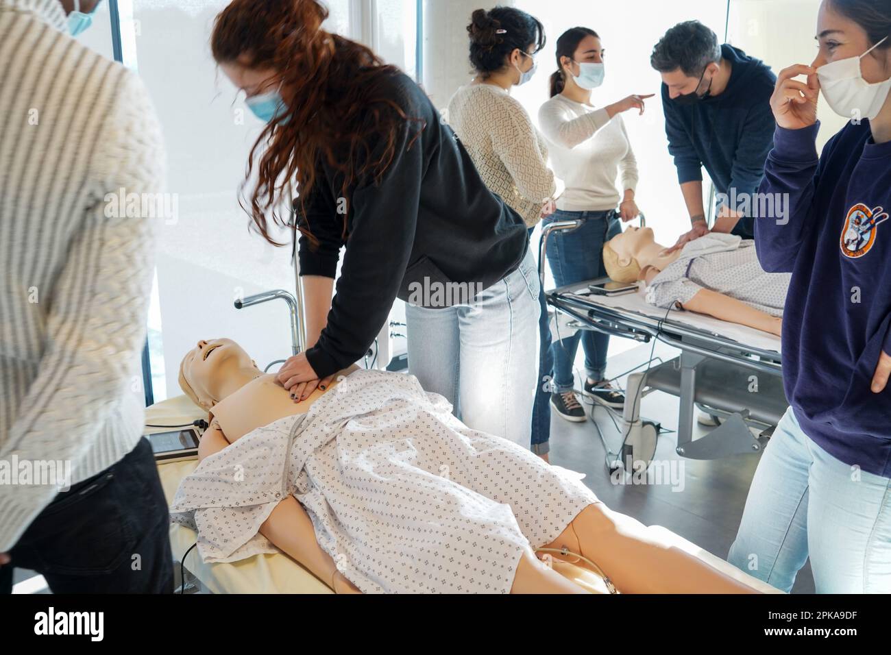 5th year medical students during a SimMan dummy cardiac massage ...