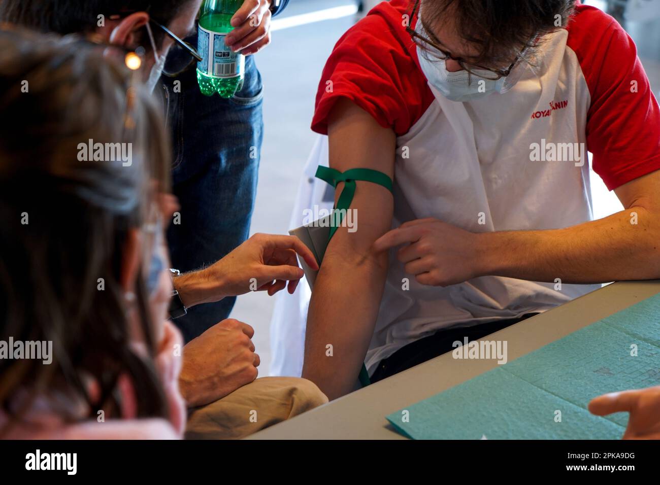 5th year medical students during an IV placement workshop. Students ...