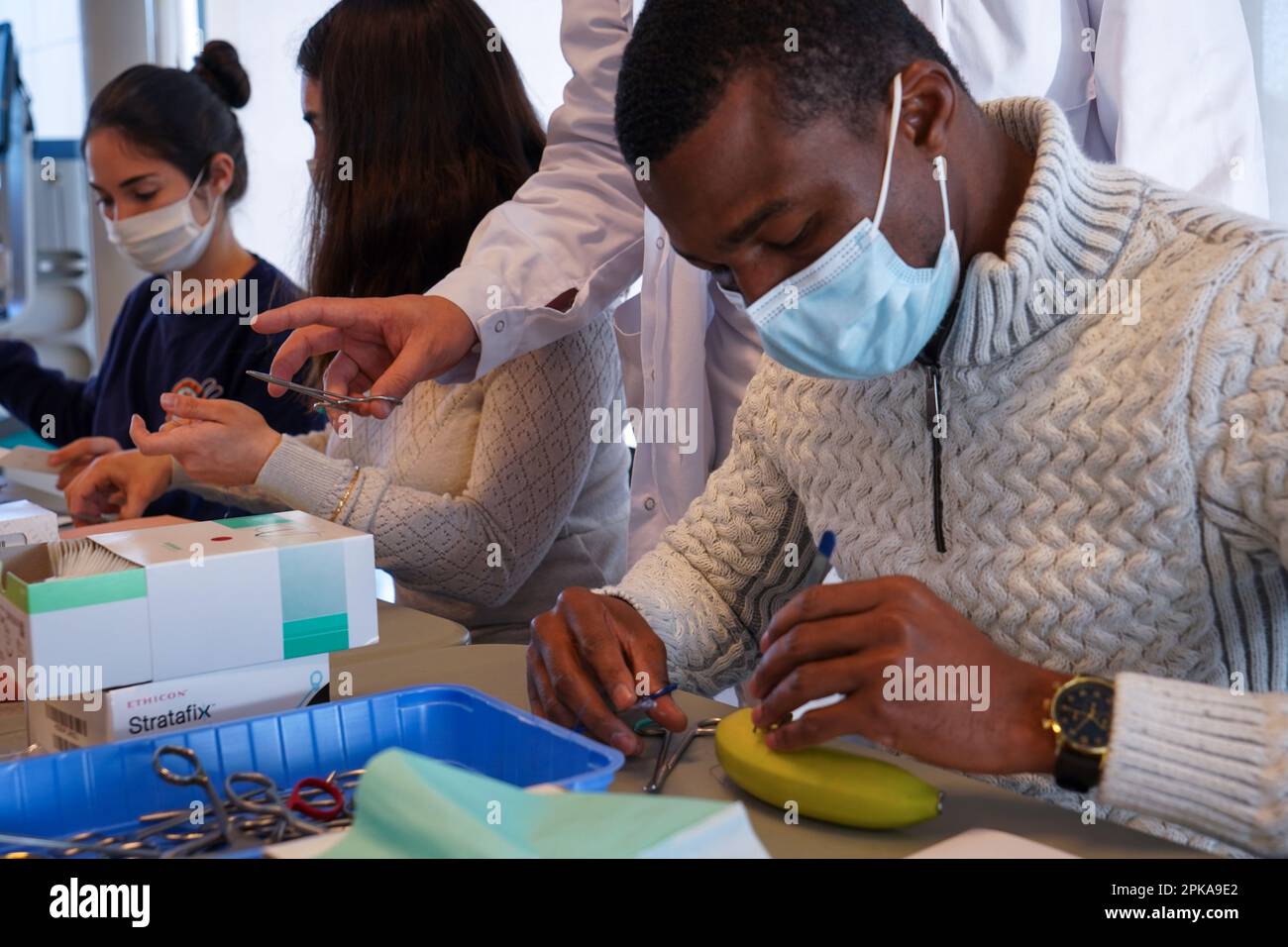 5th year students during a sewing workshop. The students learn the ...
