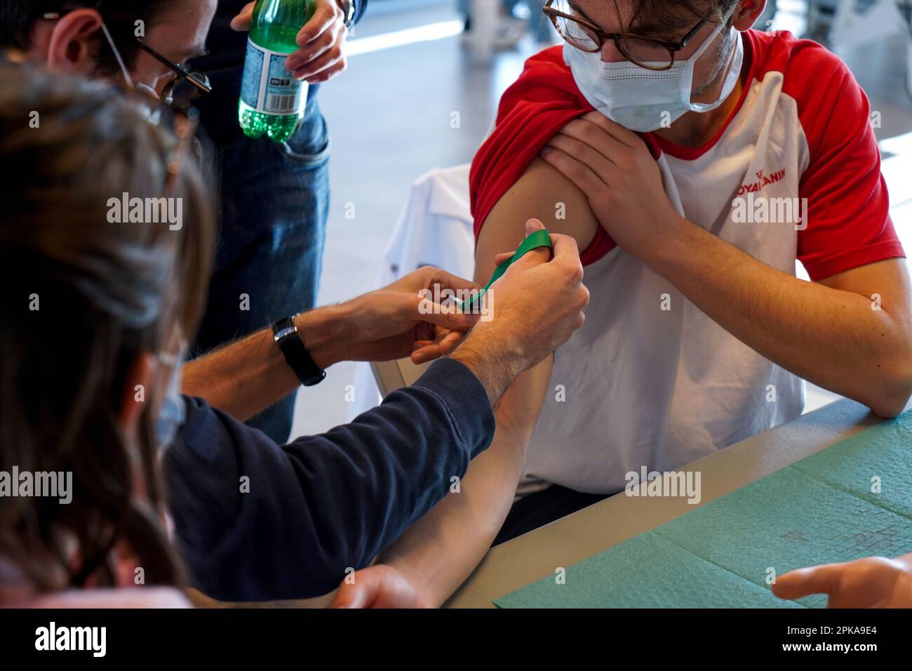 5th year medical students during an IV placement workshop. Students ...