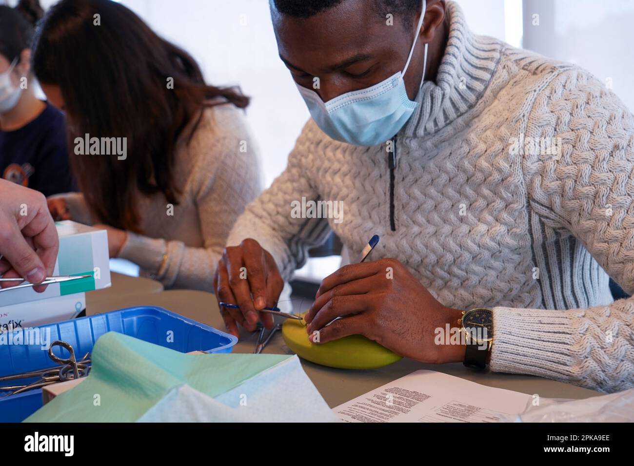 5th year students during a sewing workshop. The students learn the ...