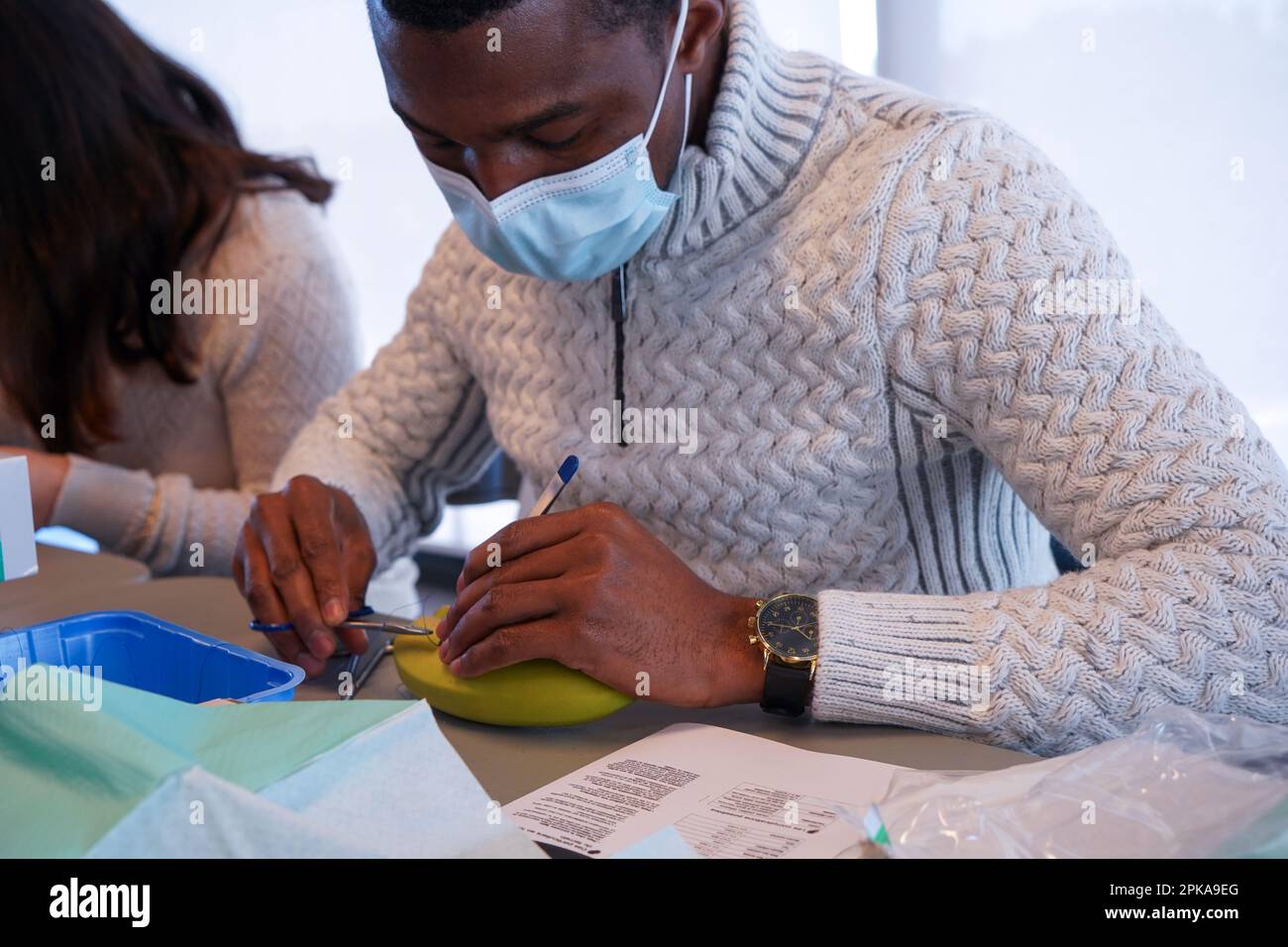 5th year students during a sewing workshop. The students learn the ...