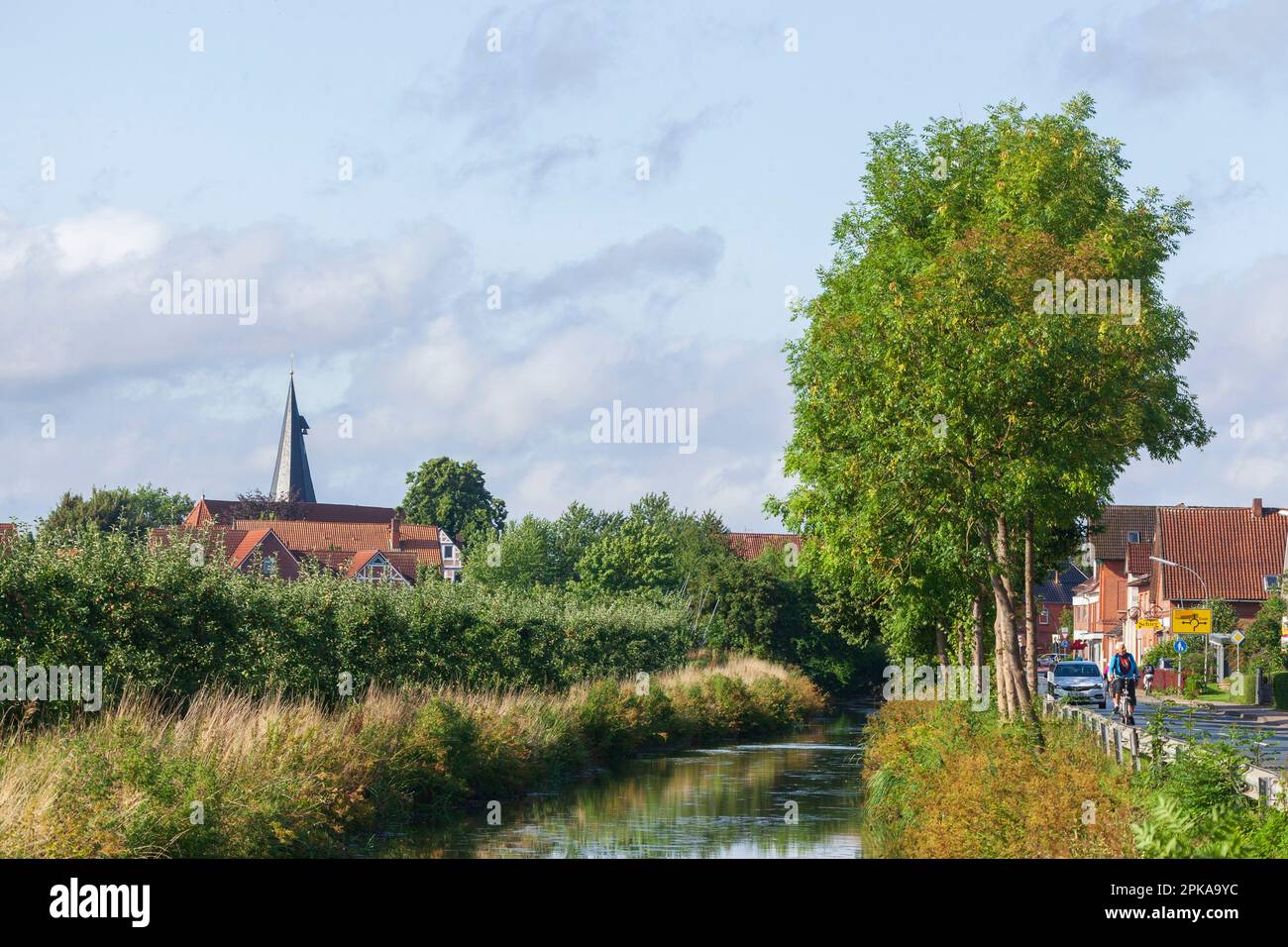 Apple orchard and St. Matthias church, Jork, Altes Land, Lower Saxony ...