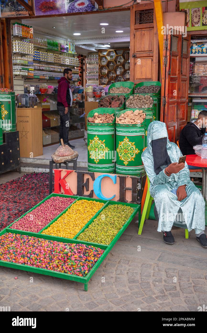 Morocco, Marrakech, market, colorful, flowers, seeds, veiled woman ...