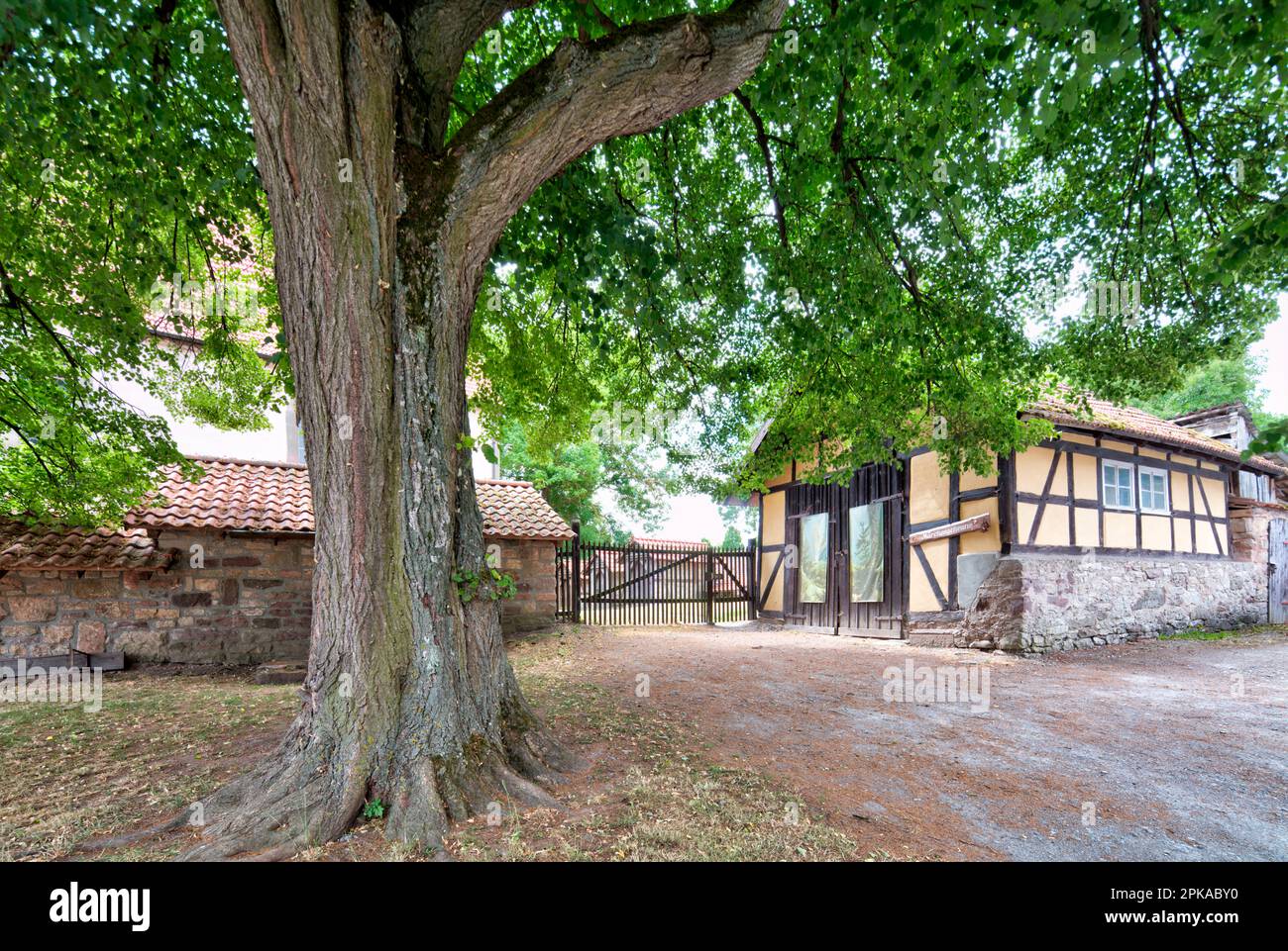 Church castle, fairy barn, half-timbering, house facade, village view ...
