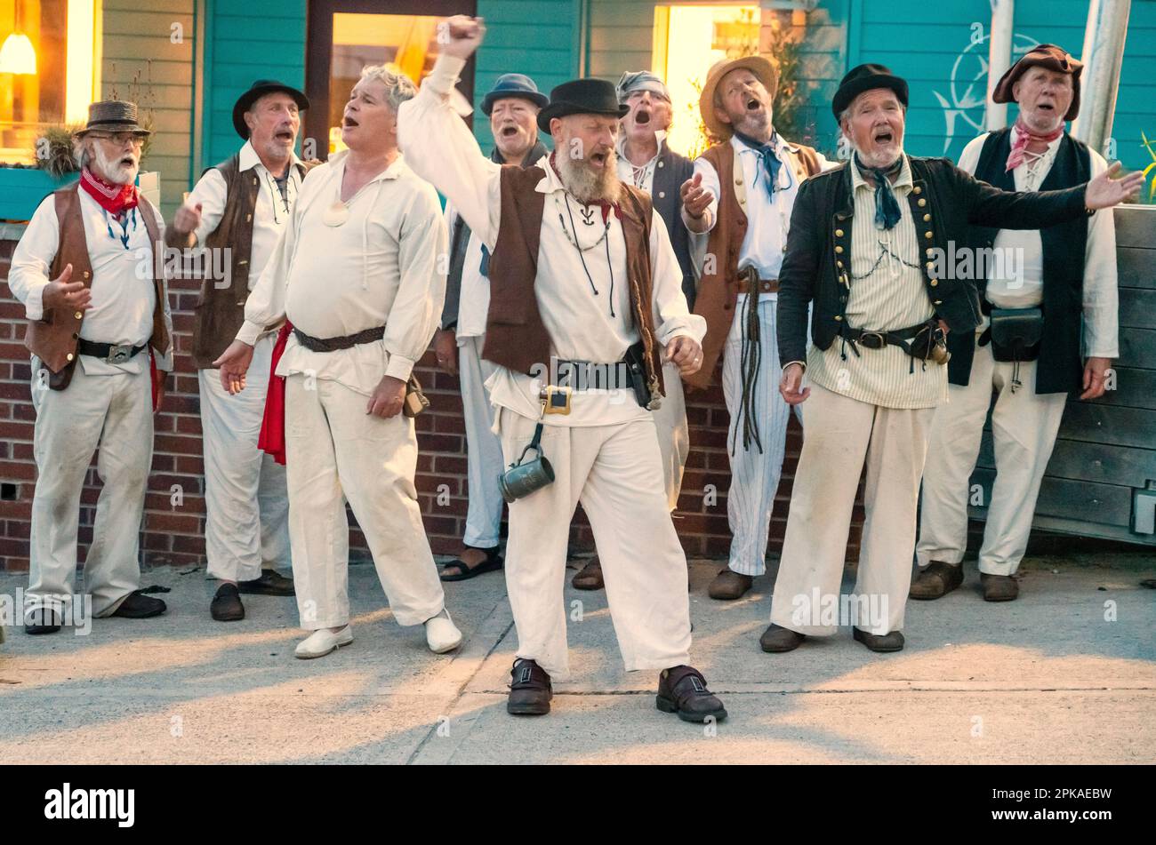 The Exmouth Shanty Men busk on the Exmouth Harbour front for tourists ...