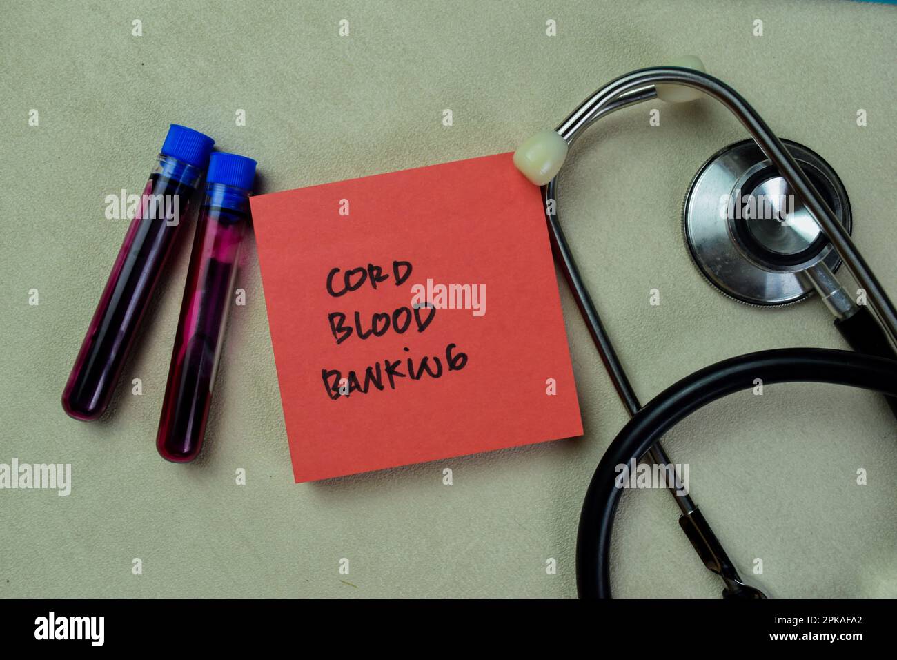 Concept of Cord Blood Banking write on sticky notes with stethoscope ...
