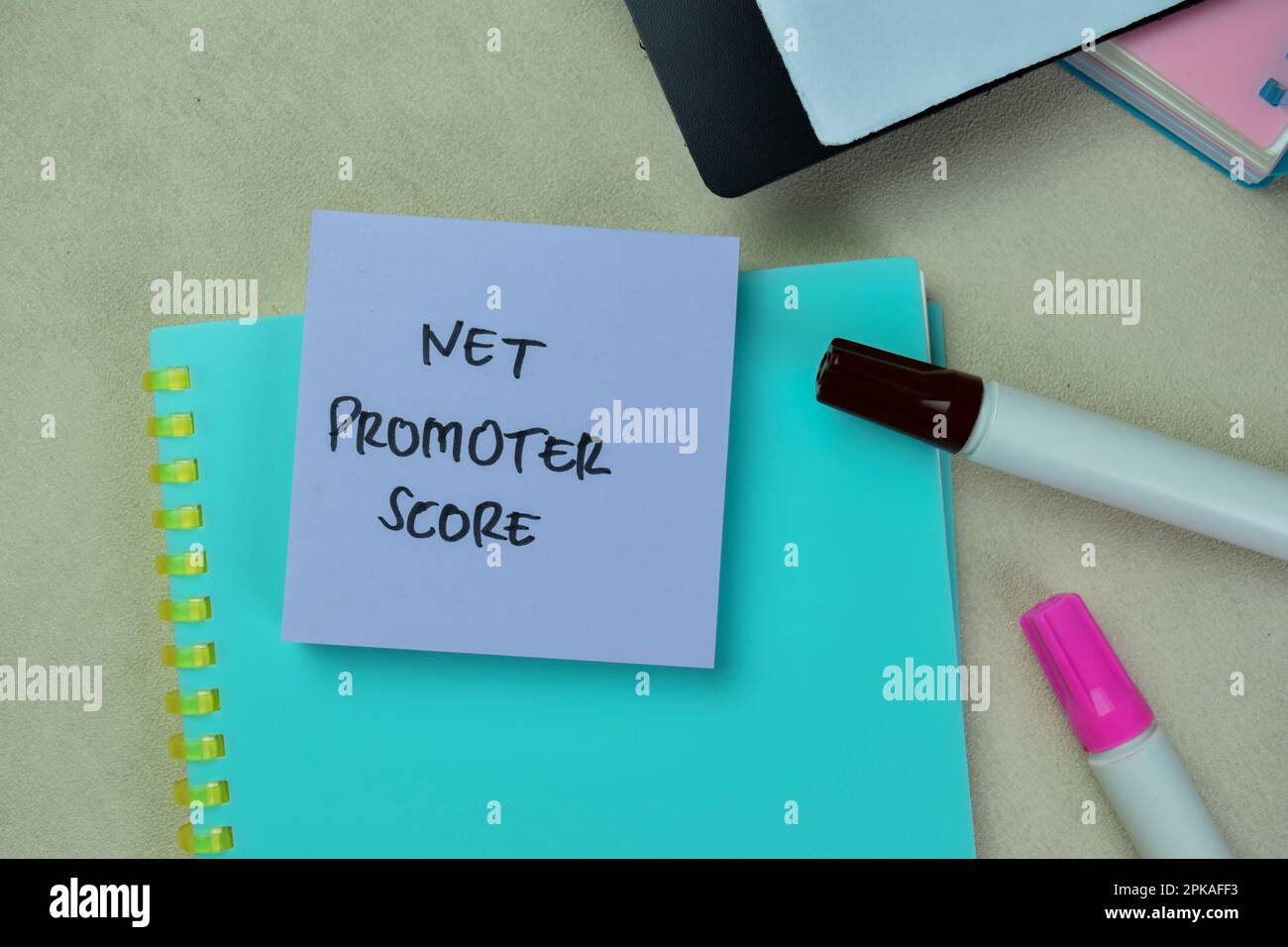 Concept of Net Promoter Score write on sticky notes isolated on Wooden ...