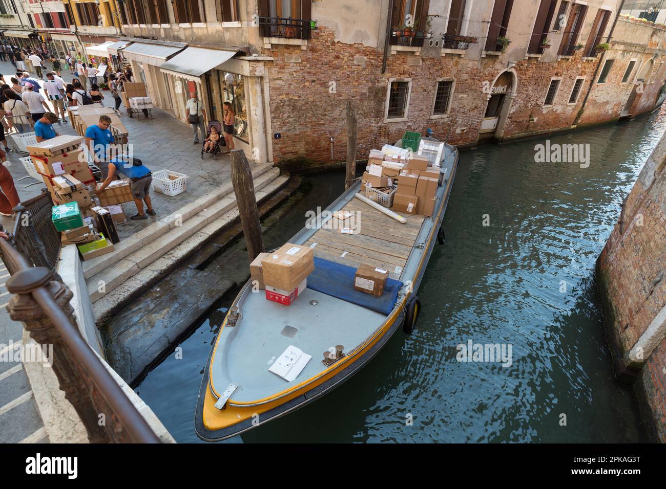Venice amazon delivery boat hi-res stock photography and images - Alamy
