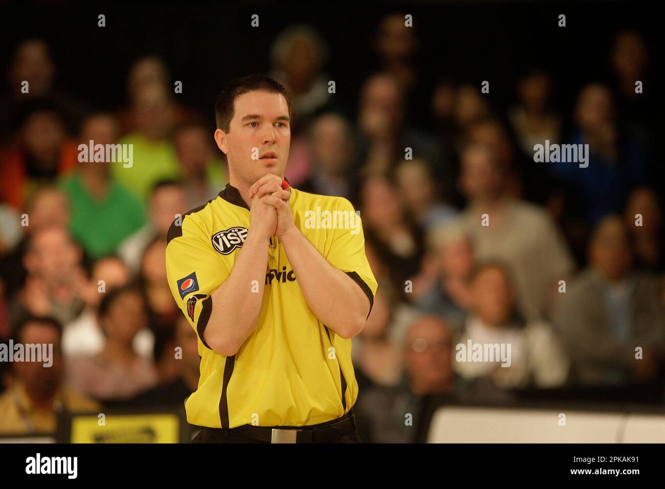 Sean Rash watches as his ball heads towards the pins during the men's ...