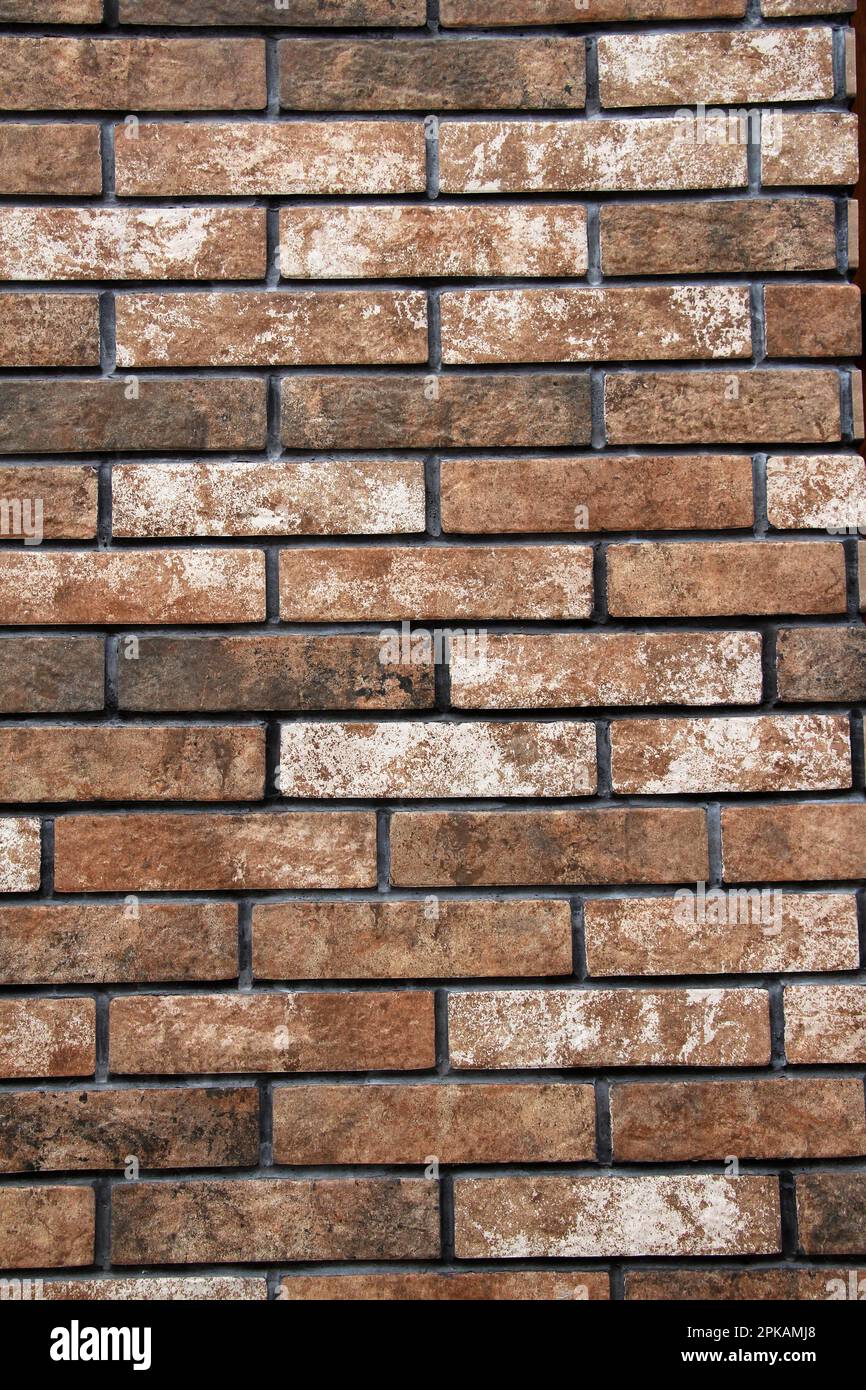 A fragment of decorative masonry of a brick wall Stock Photo - Alamy