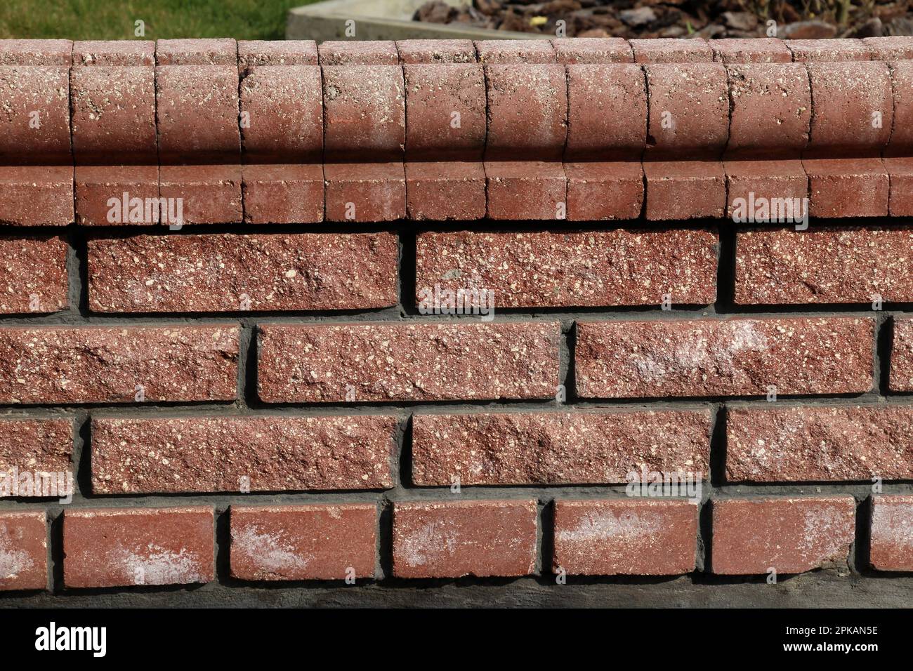 A fragment of decorative masonry of a brick wall Stock Photo - Alamy