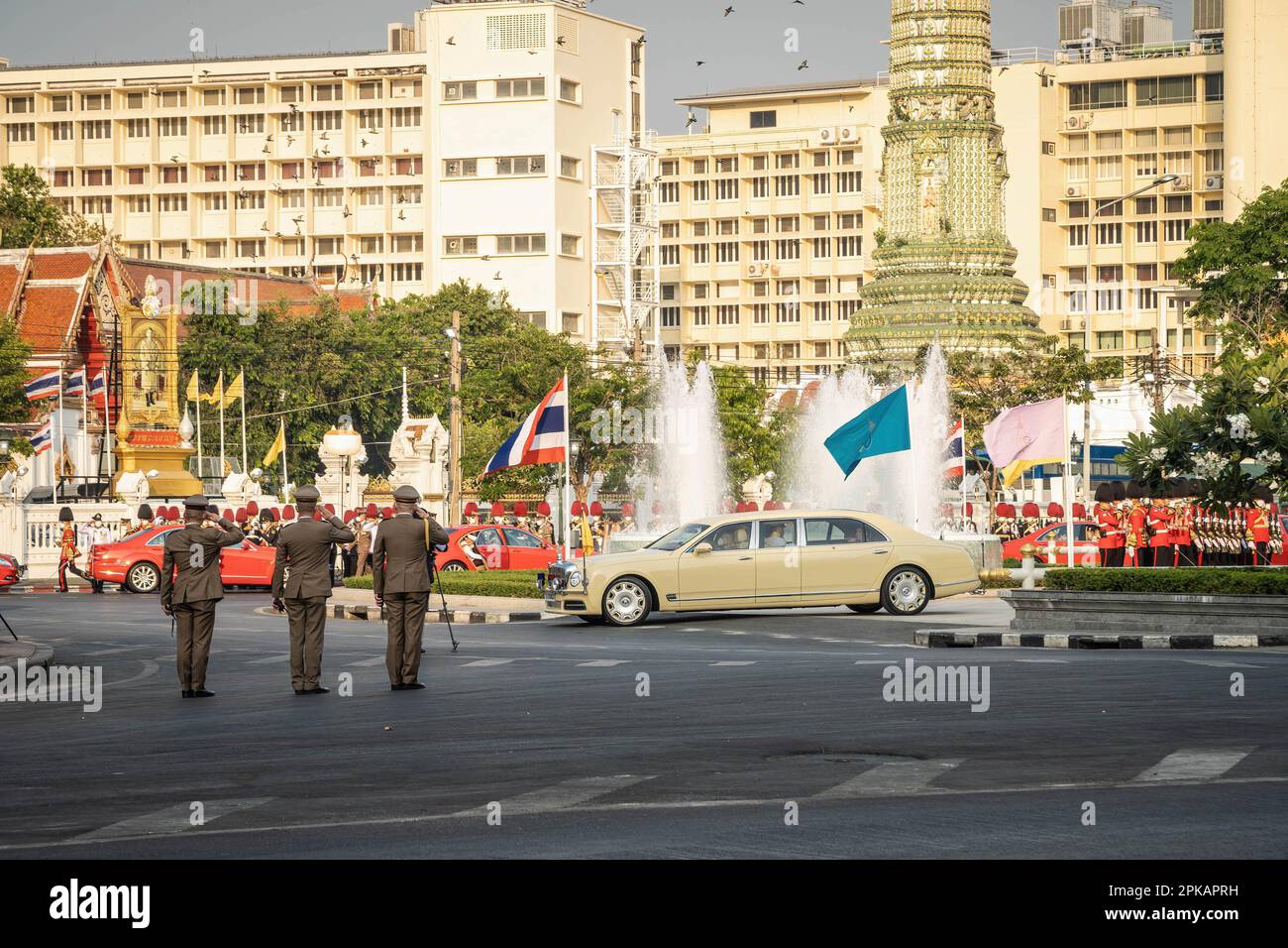 King Rama X accompanied by his wife in his car, surrounded by the royal ...