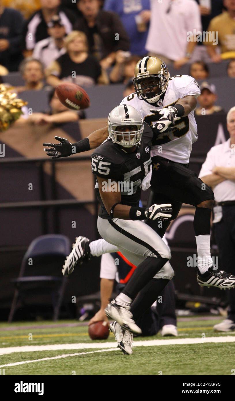 Oakland Raiders Jon Alston (55) covers New Orleans Saints Reggie Bush ...